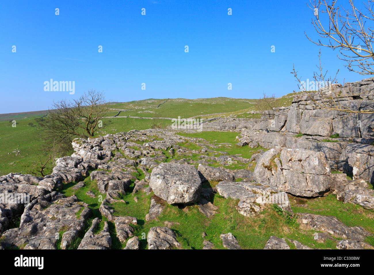 The Pennine Way on Malham Cove limestone pavement, Malham, Malhamdale ...