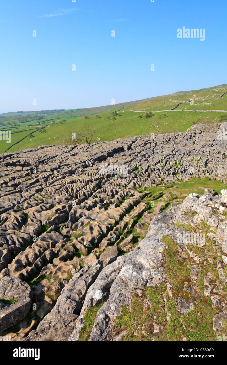 The Pennine Way on Malham Cove limestone pavement, Malham, Malhamdale ...