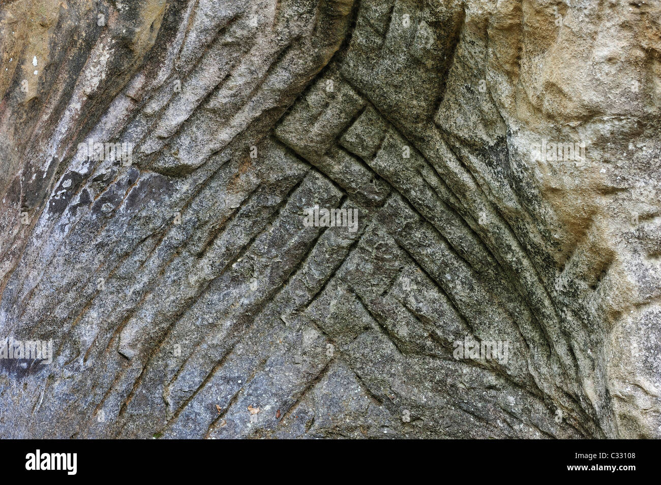 Grooves in sandstone rock from carving millstones at the Hohllay cave ...