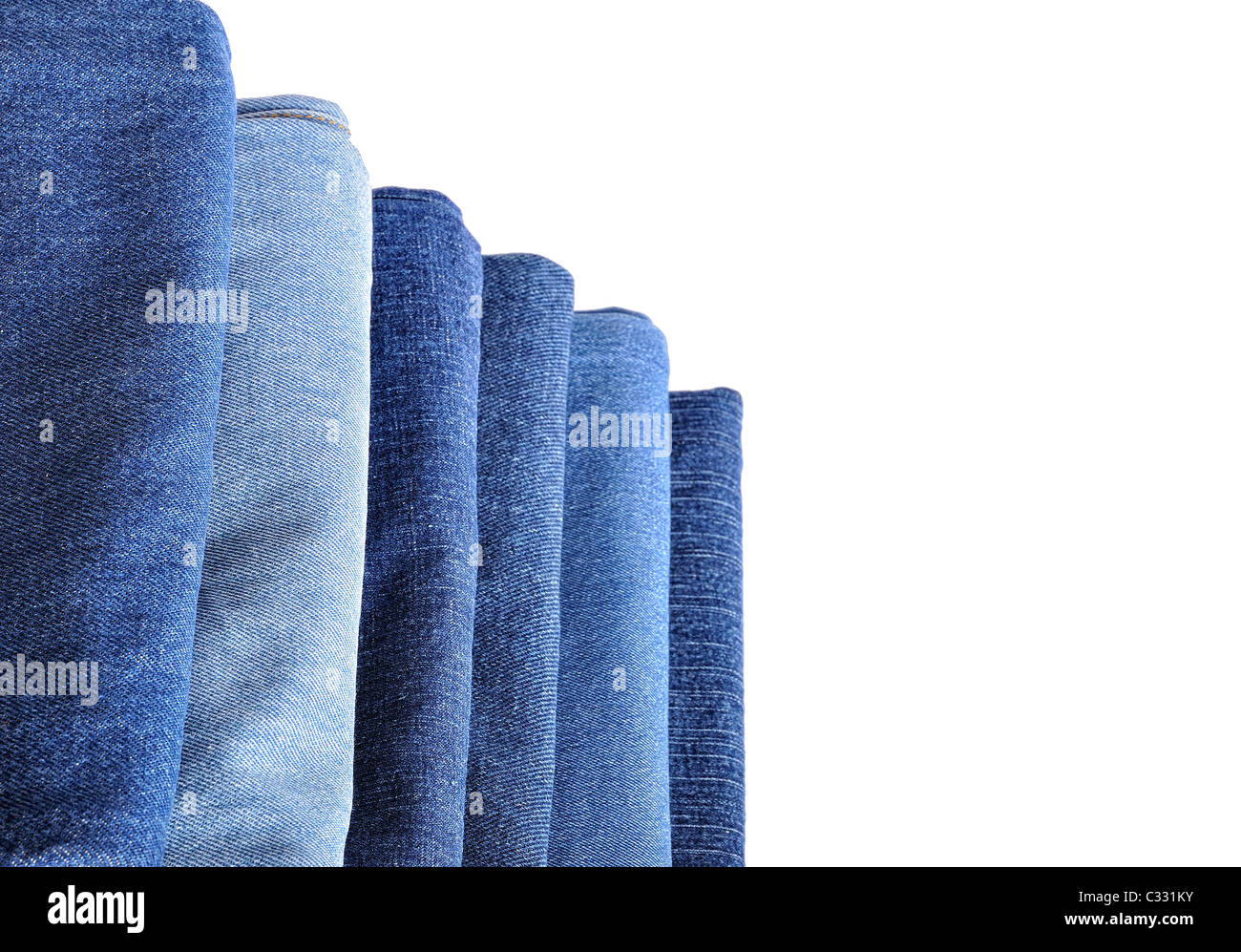 Stack of jeans isolated Stock Photo - Alamy