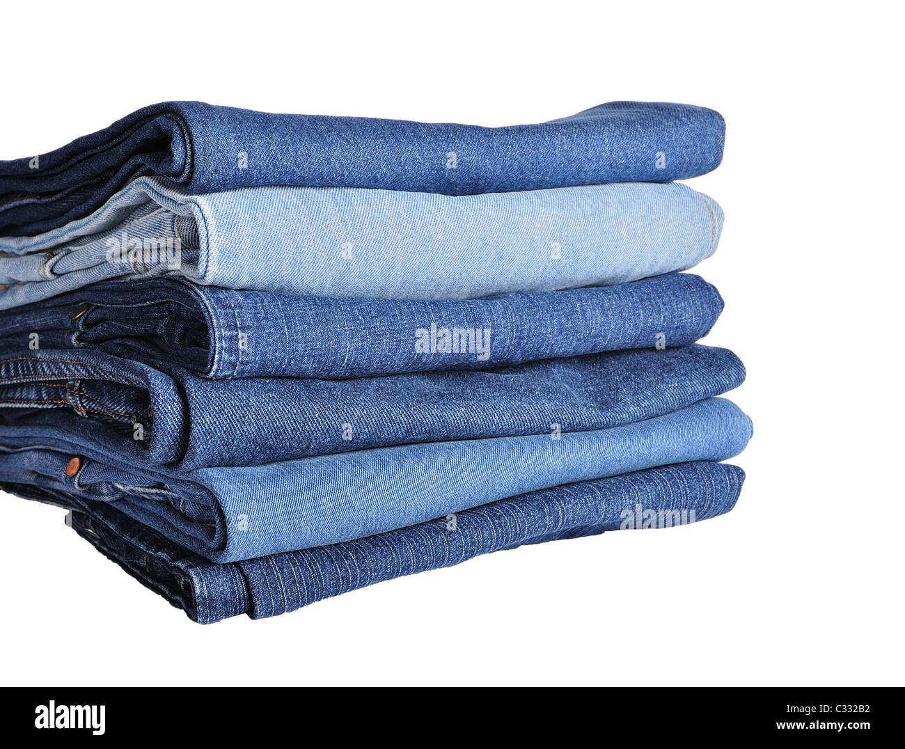 Stack of jeans isolated Stock Photo - Alamy