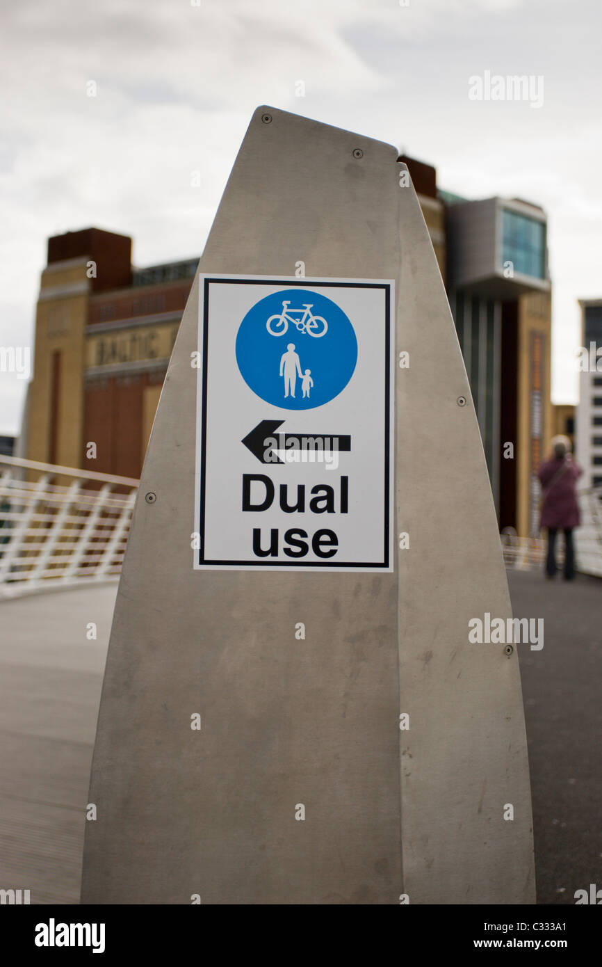Dual Use sign on Millenium Bridge Newcastle Upon Tyne Stock Photo - Alamy