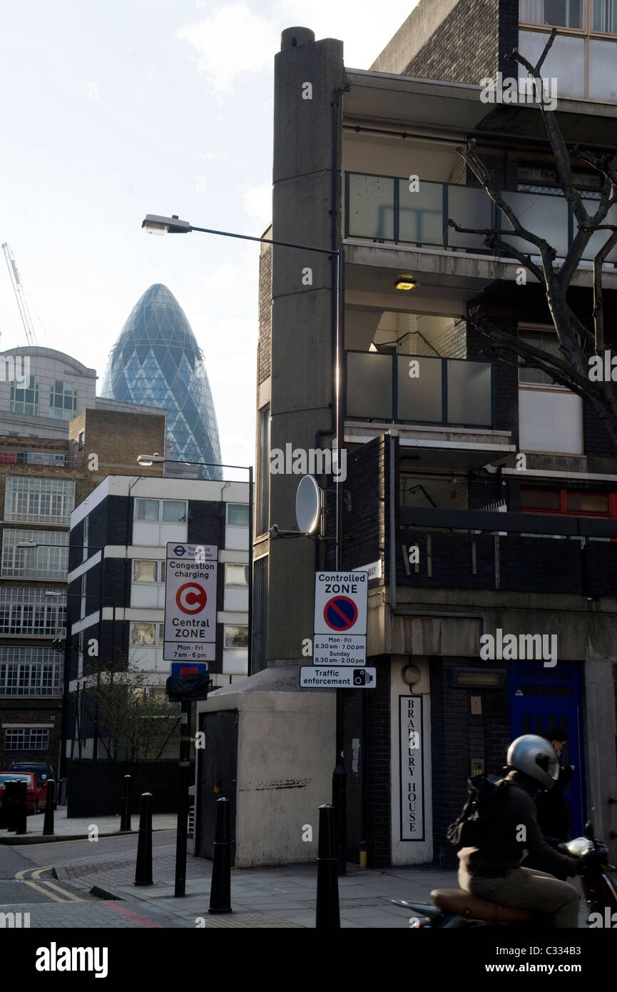 Gherkin visible from side street in central London Stock Photo - Alamy