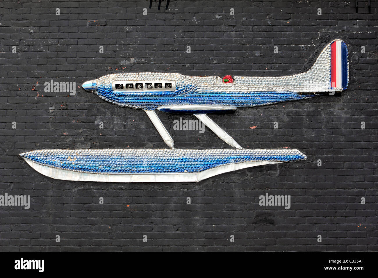 Sea plane mosaic on building at Calshot on Southampton Water where it ...
