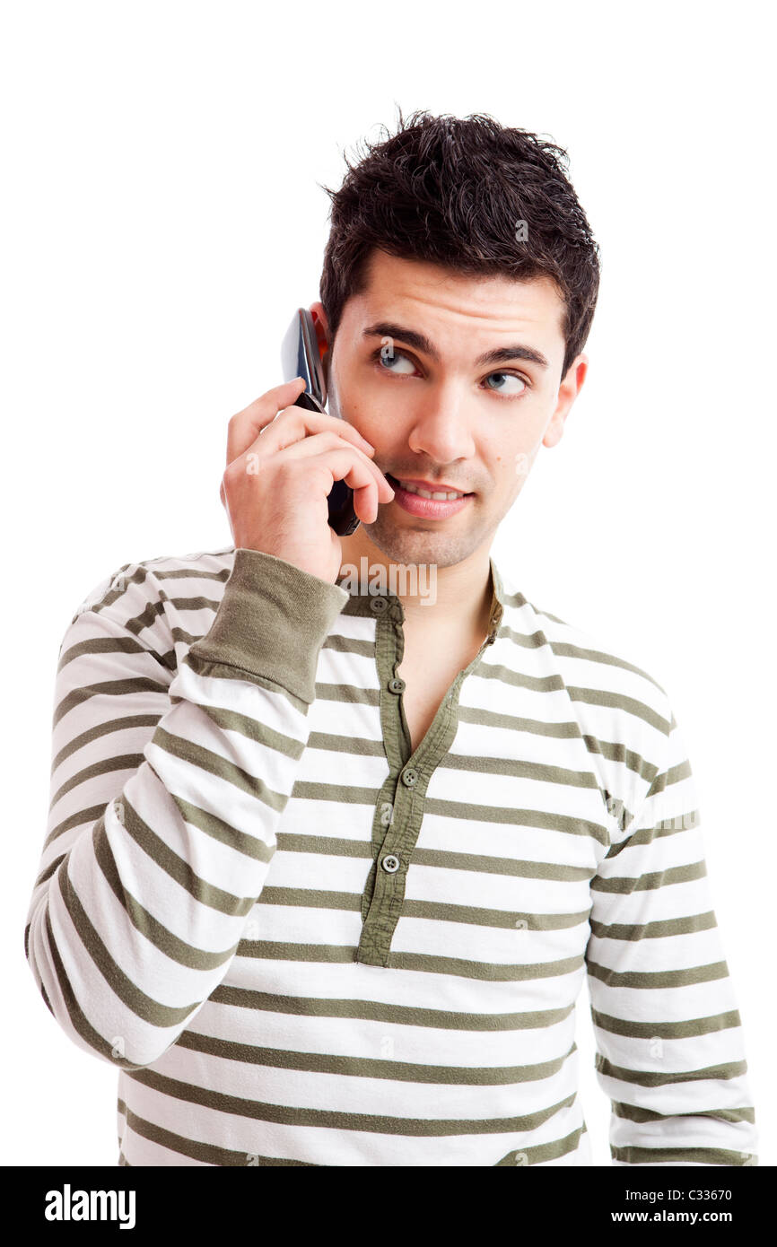 Handsome young man making a phone call, isolated on white background ...