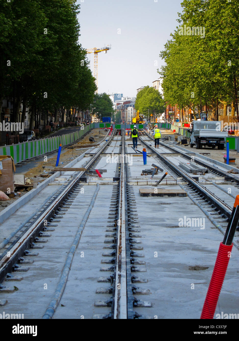 Paris, France, Tramway T3 Construction Site, Men Laying Tracks on City ...