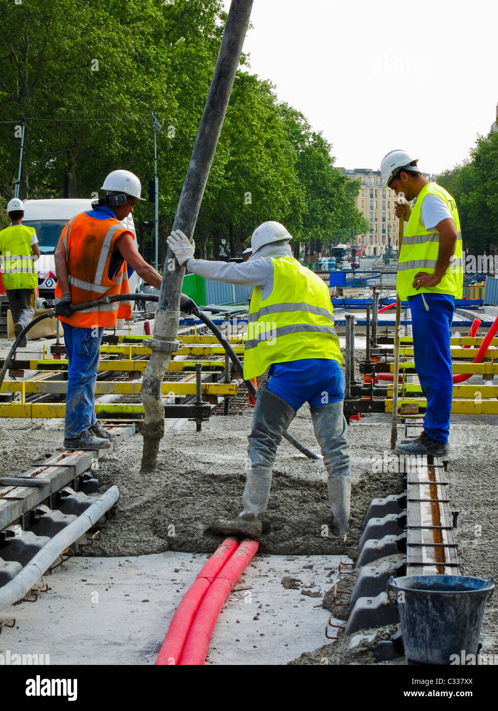 Paris, France, Tramway T3 Workers at Construction Site, Men Pouring ...