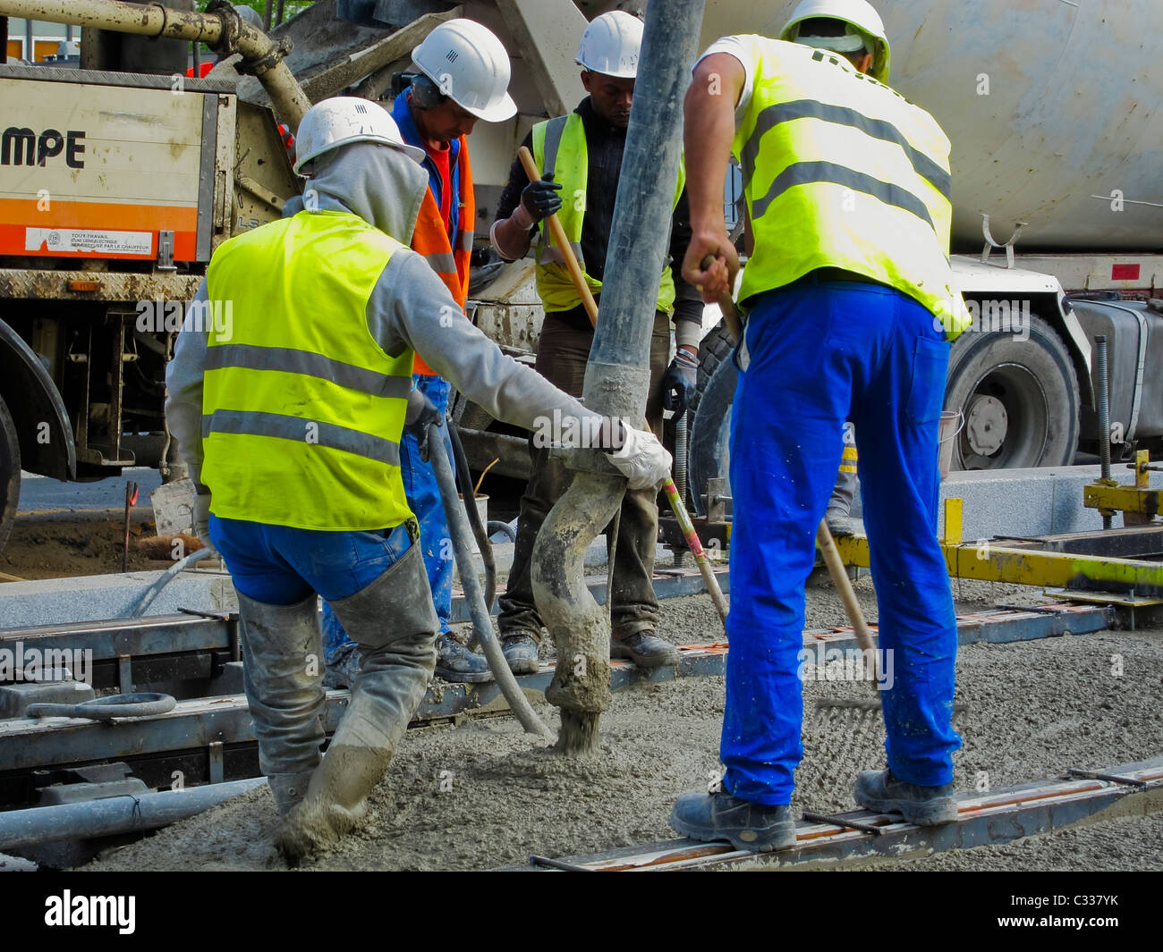 Paris, France, Tramway T3 Workers at Construction Site, Men Laying ...