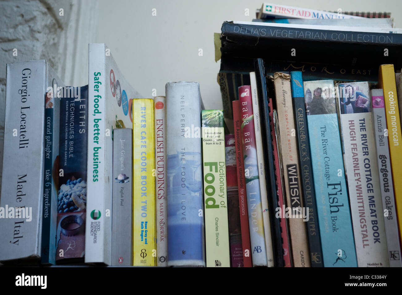 cookbooks on a shelf, cook books, cookery books Stock Photo - Alamy