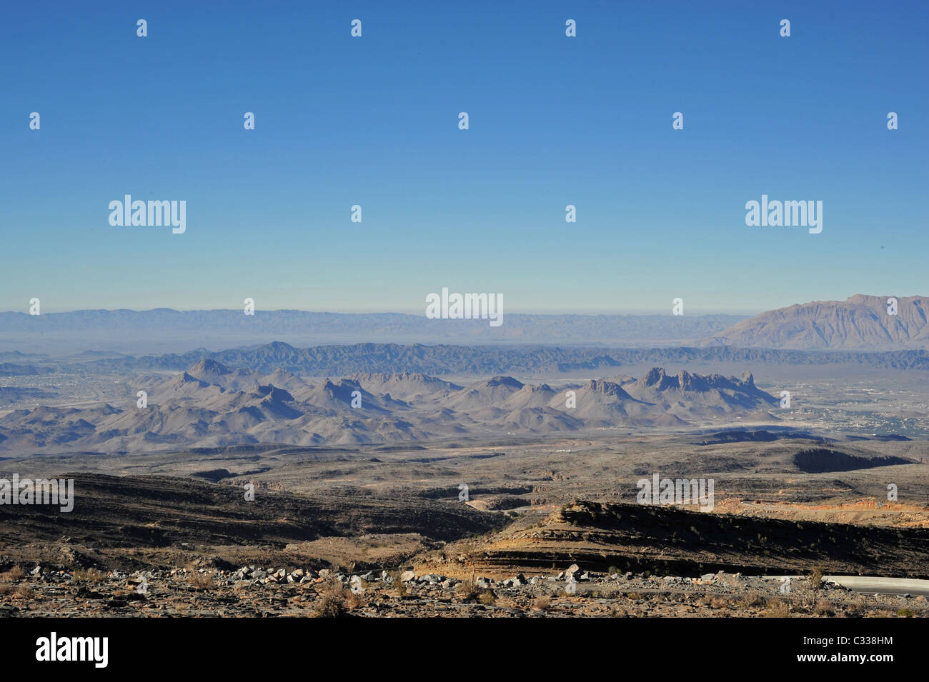 Oman, Western Hajar Mountains, mountain range with vast landscape in an ...