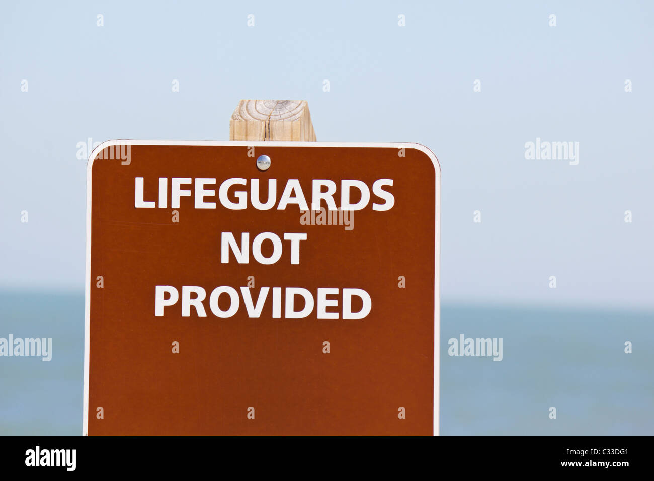Lifeguards warning sign hi-res stock photography and images - Alamy