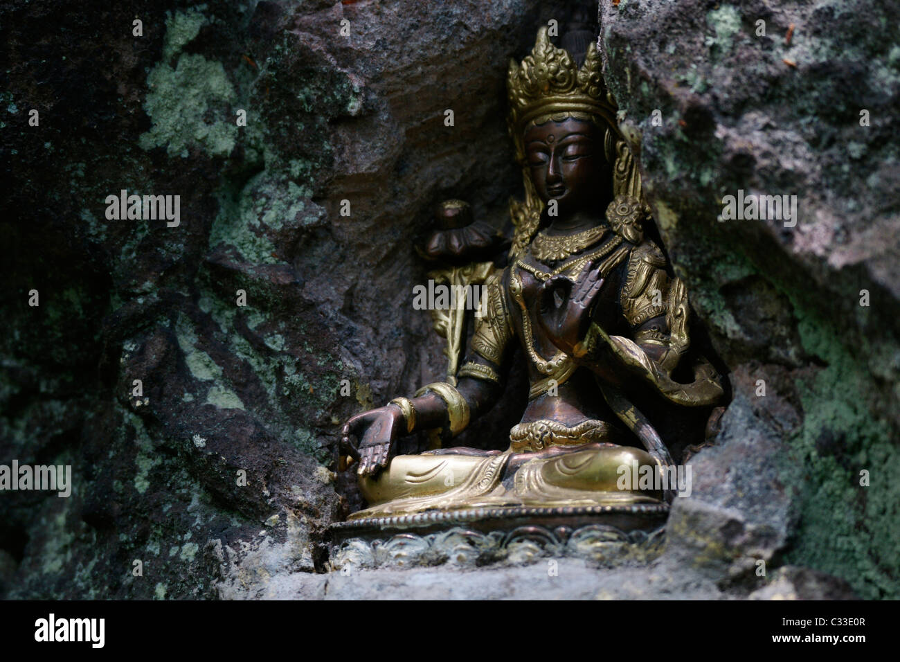 White Tara brass metal sculpture buddhist meditational deity in rock ...