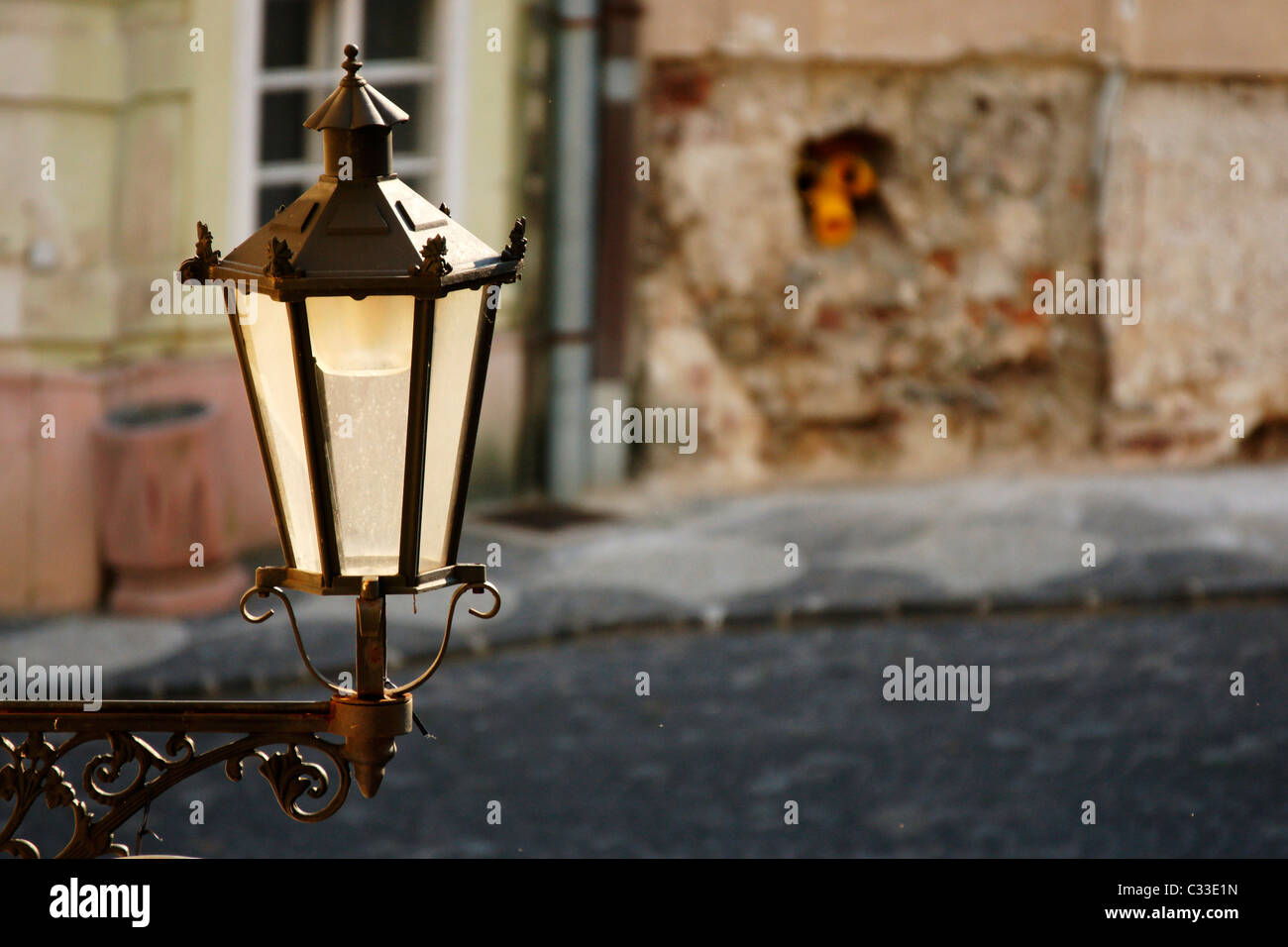 Historic streetlight lantern lamp side wall on historic buildings of ...