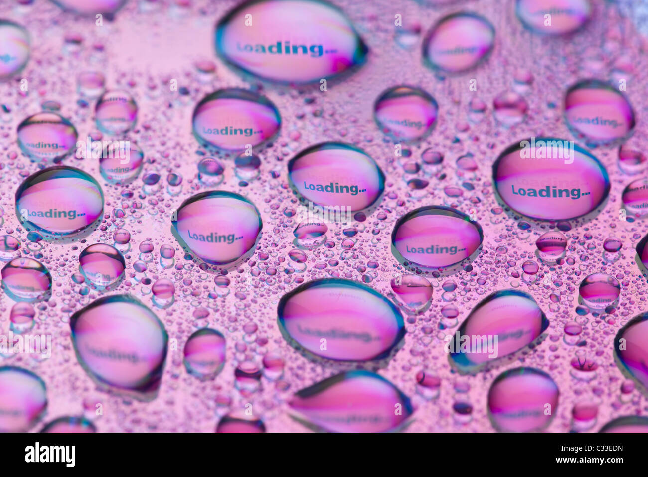 Envelope symbol reflected in the drops of water. Close-up of water ...