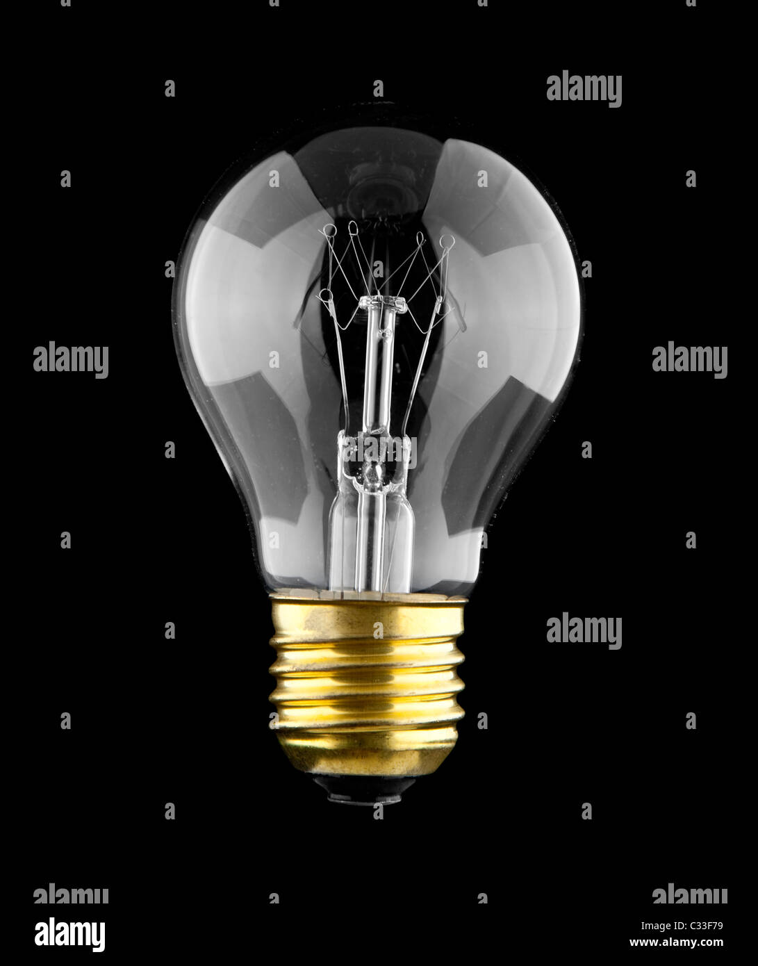 Light bulb with clear glass isolated on black Stock Photo - Alamy