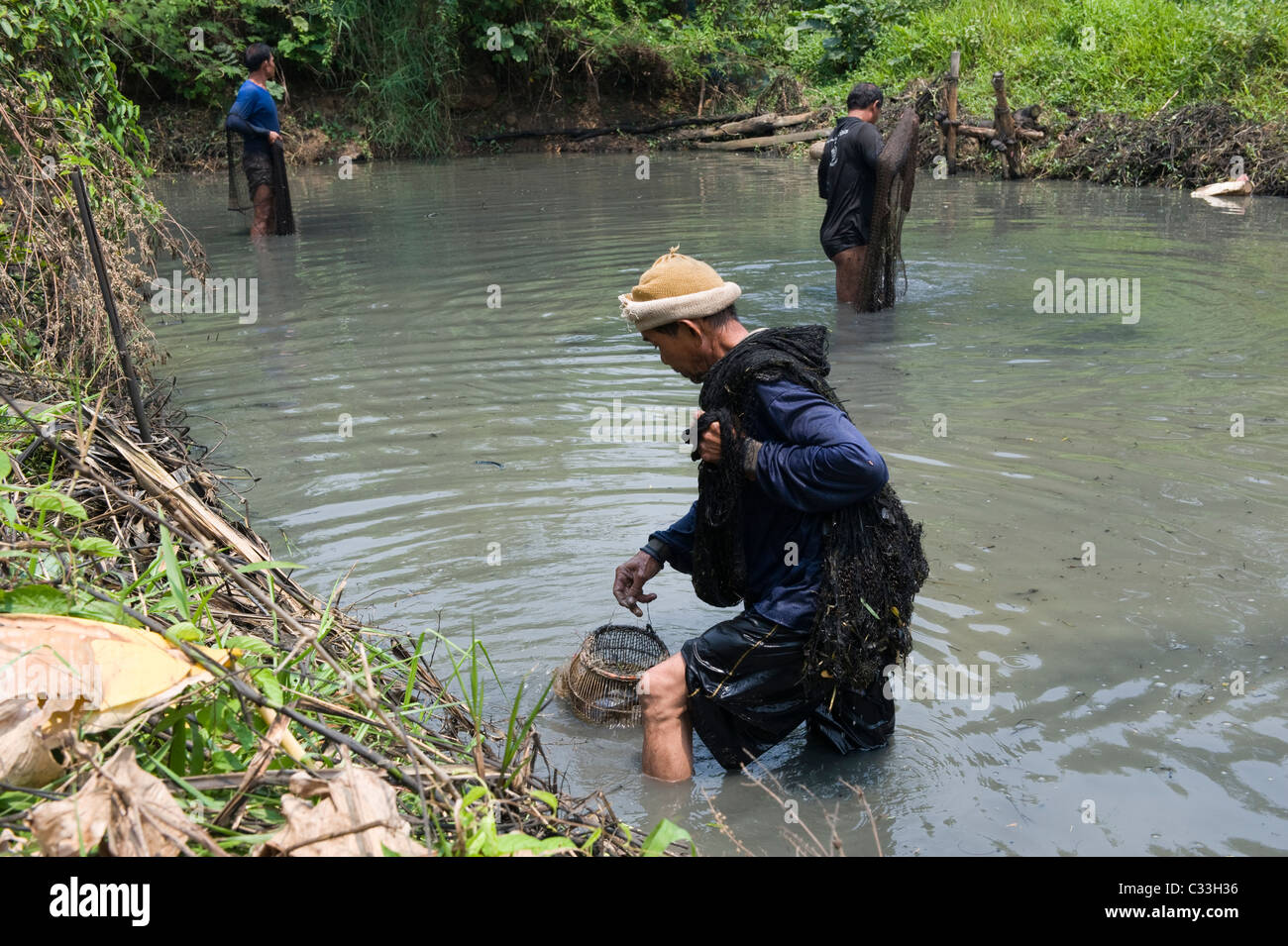 Traditional freshwater fishing in Isan North East Thailand using ...