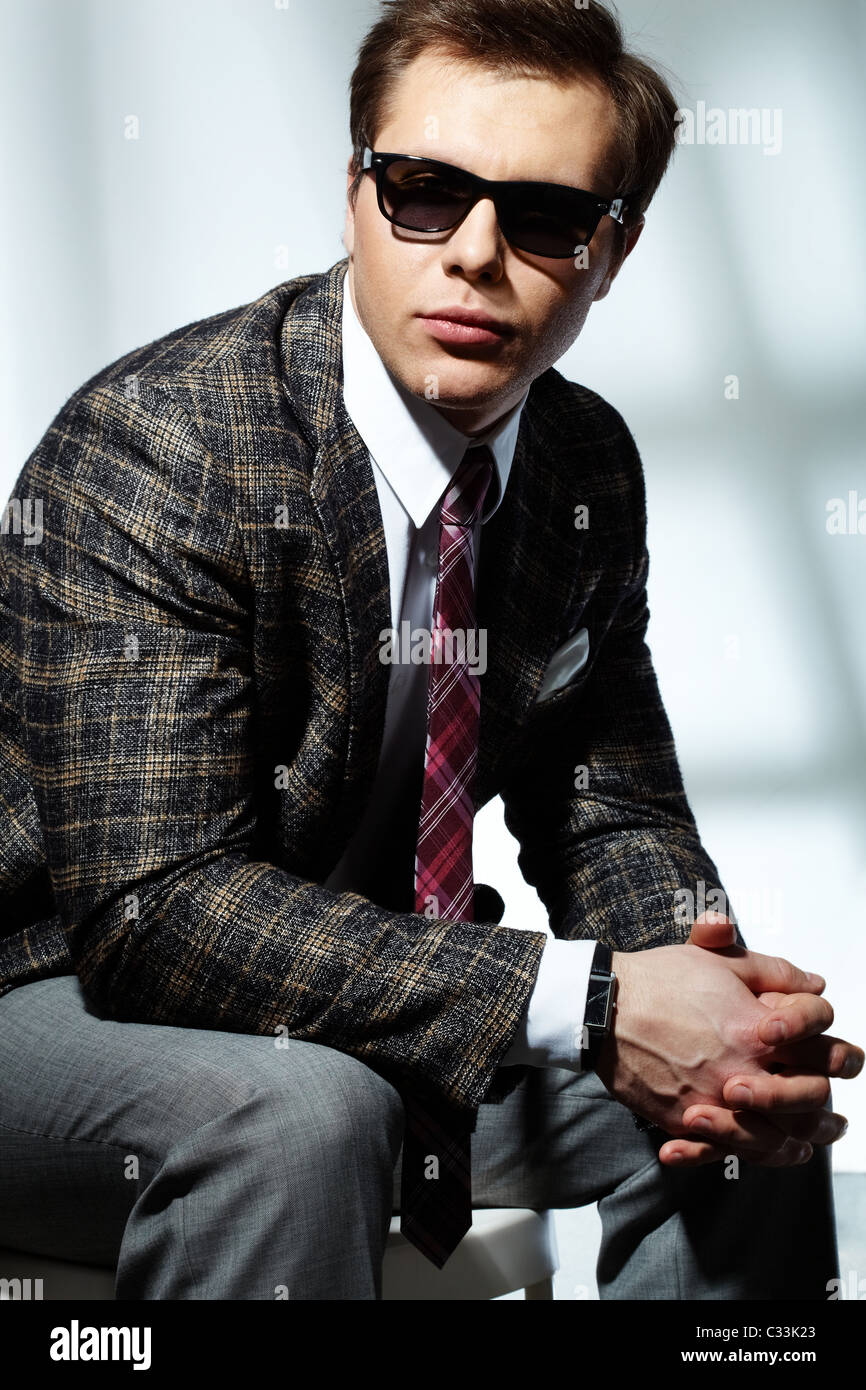 Image of elegant man posing in front of camera Stock Photo - Alamy