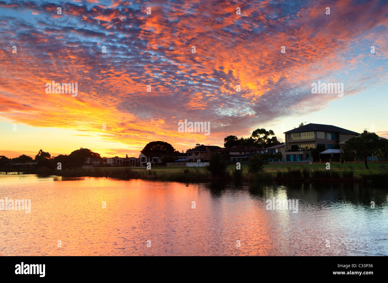 Large lakeside houses at sunset in affluent South Perth, Western ...