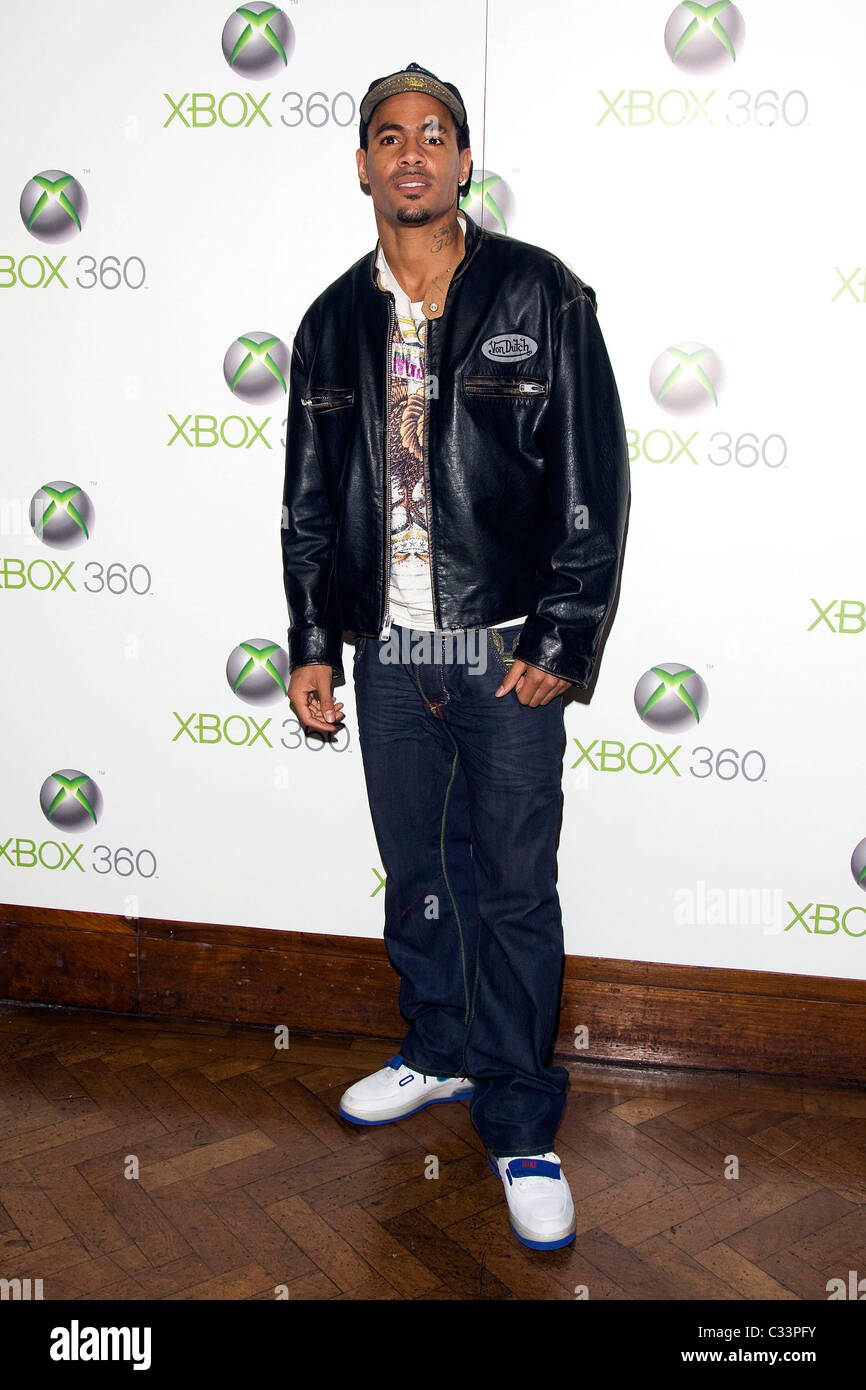 MC Harvey arrives at the New Xbox Experience Launch Party held at the ...