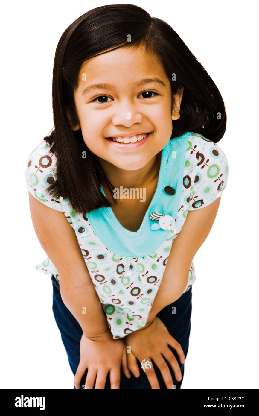 Innocent girl smiling and posing isolated over white Stock Photo - Alamy