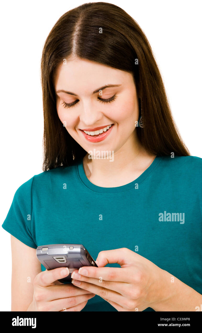 Happy woman text messaging on a mobile phone isolated over white Stock ...