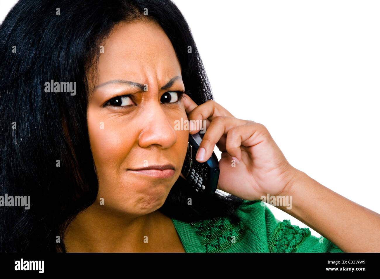 Fashion model talking on a mobile phone isolated over white Stock Photo ...