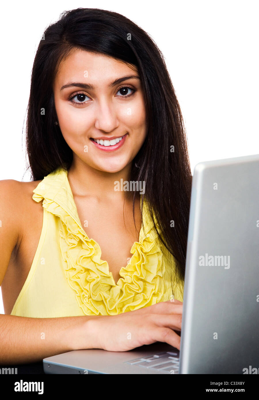 Fashion model using a laptop isolated over white Stock Photo - Alamy
