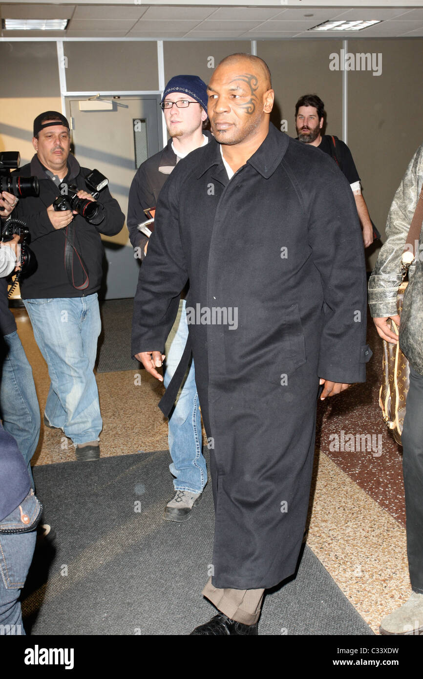 Mike Tyson arriving at Salt Lake City airport for the 2009 Sundance ...