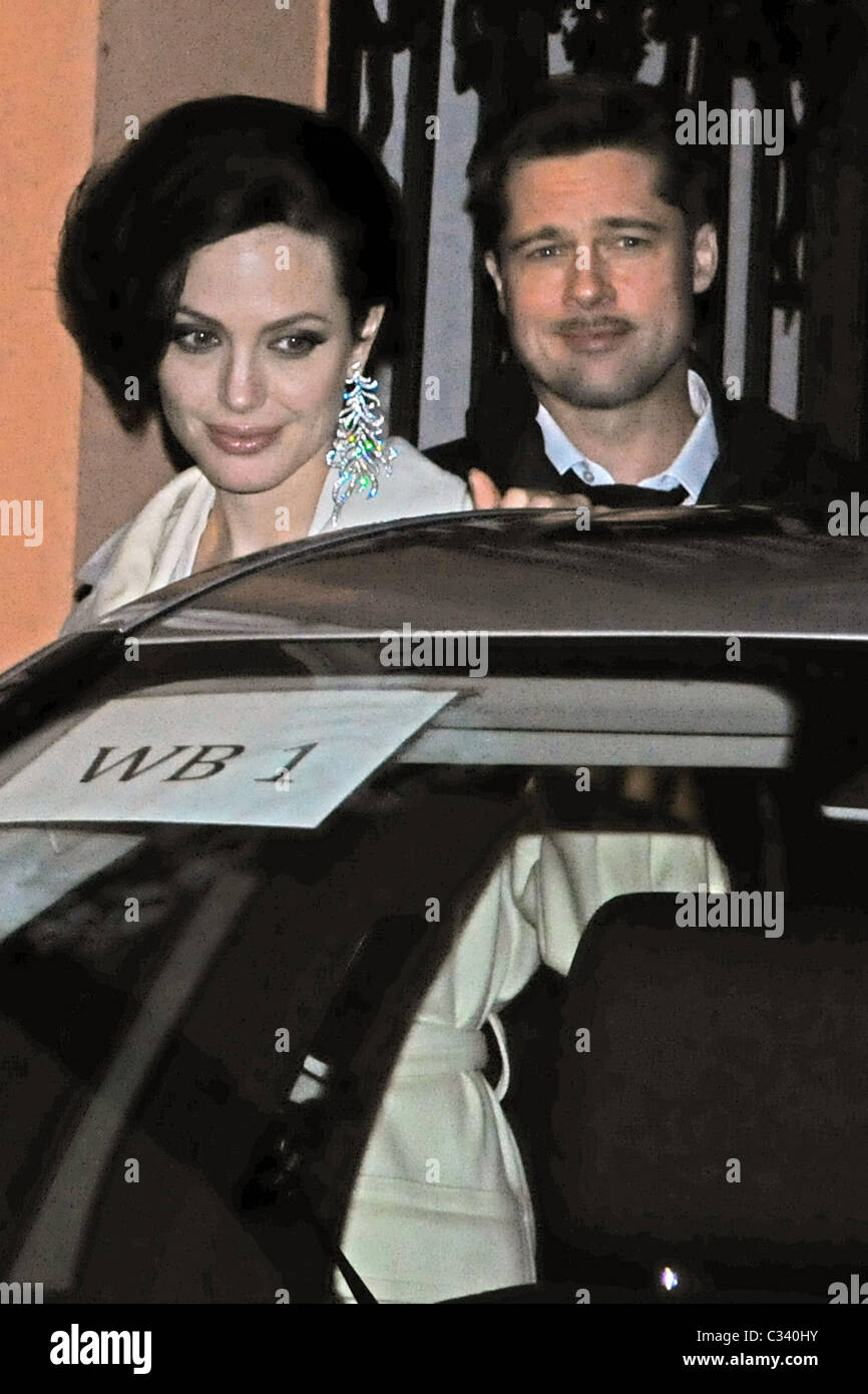 Angelina Jolie and Brad Pitt arriving at restaurant VAU after attending ...