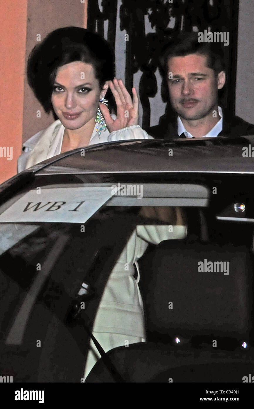 Angelina Jolie and Brad Pitt arriving at restaurant VAU after attending ...