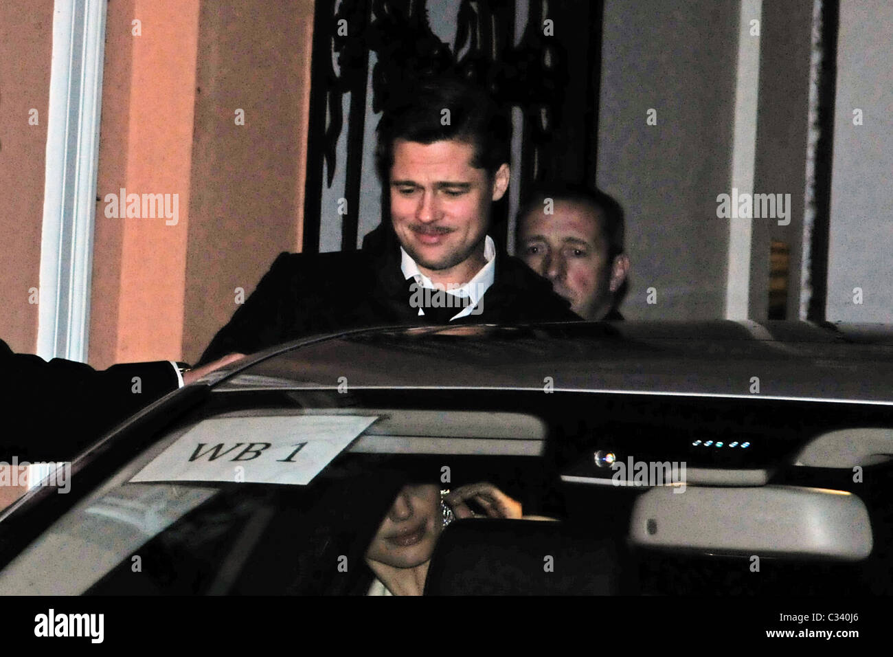 Angelina Jolie and Brad Pitt arriving at restaurant VAU after attending ...
