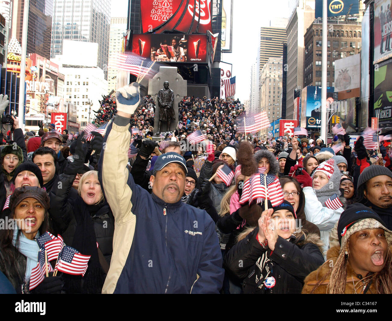 New Yorkers gather in Manhattan's Times Square to watch the live ...