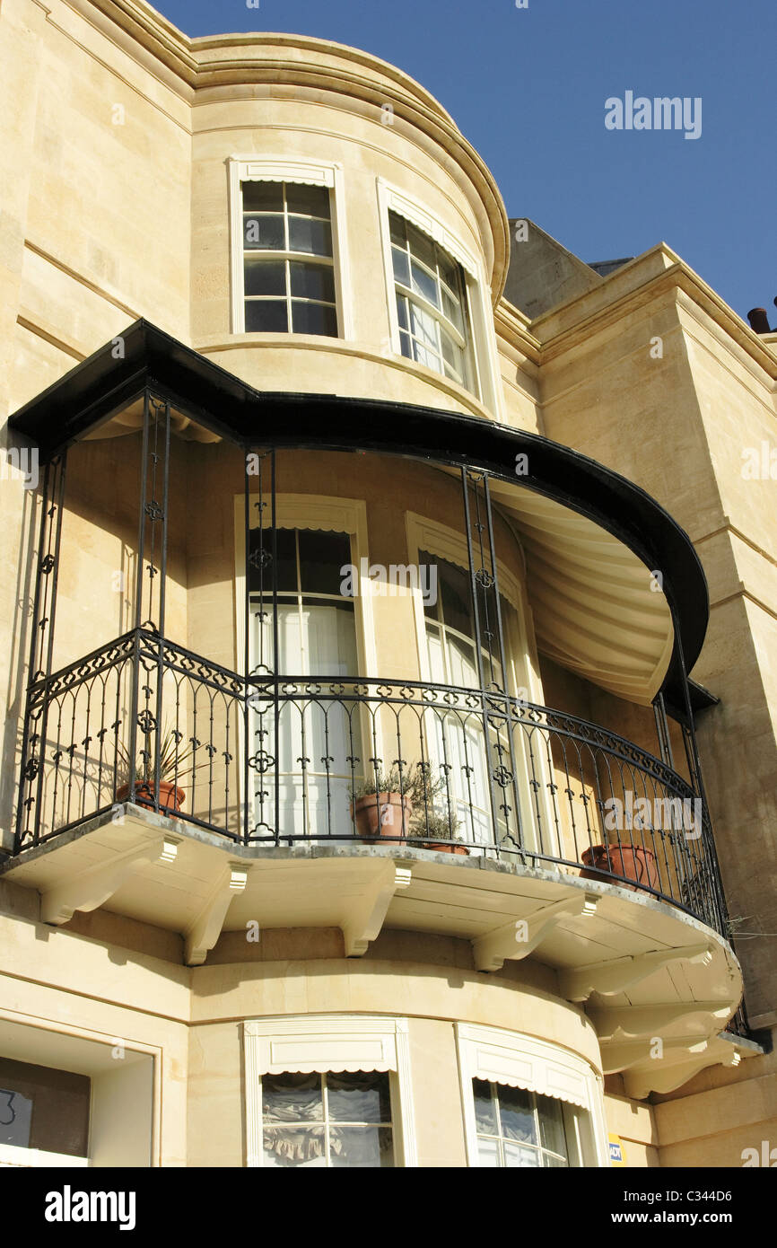 A balcony with wrought iron railings on a picturesque Georgian house in ...