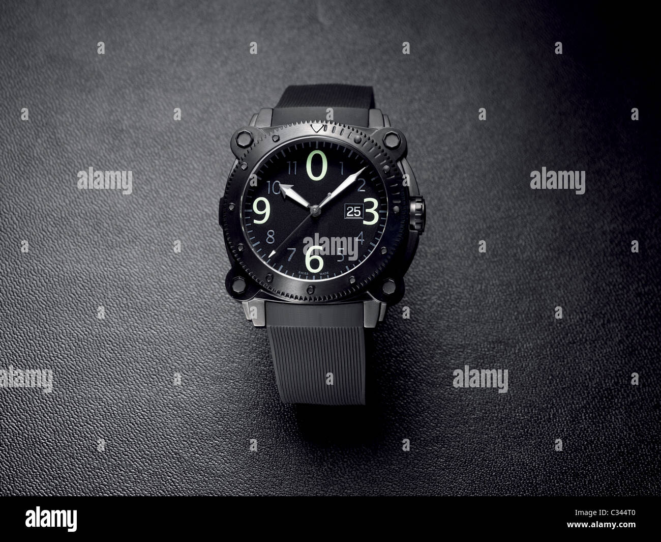 Contemporary watch on bark background Stock Photo - Alamy