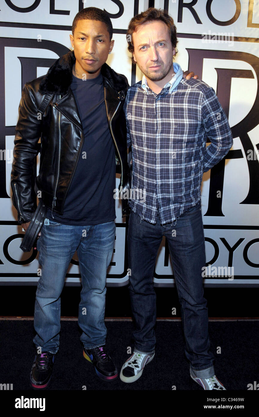 Pharrell Williams and artist Emmanuel Perrotin outside The Forge ...