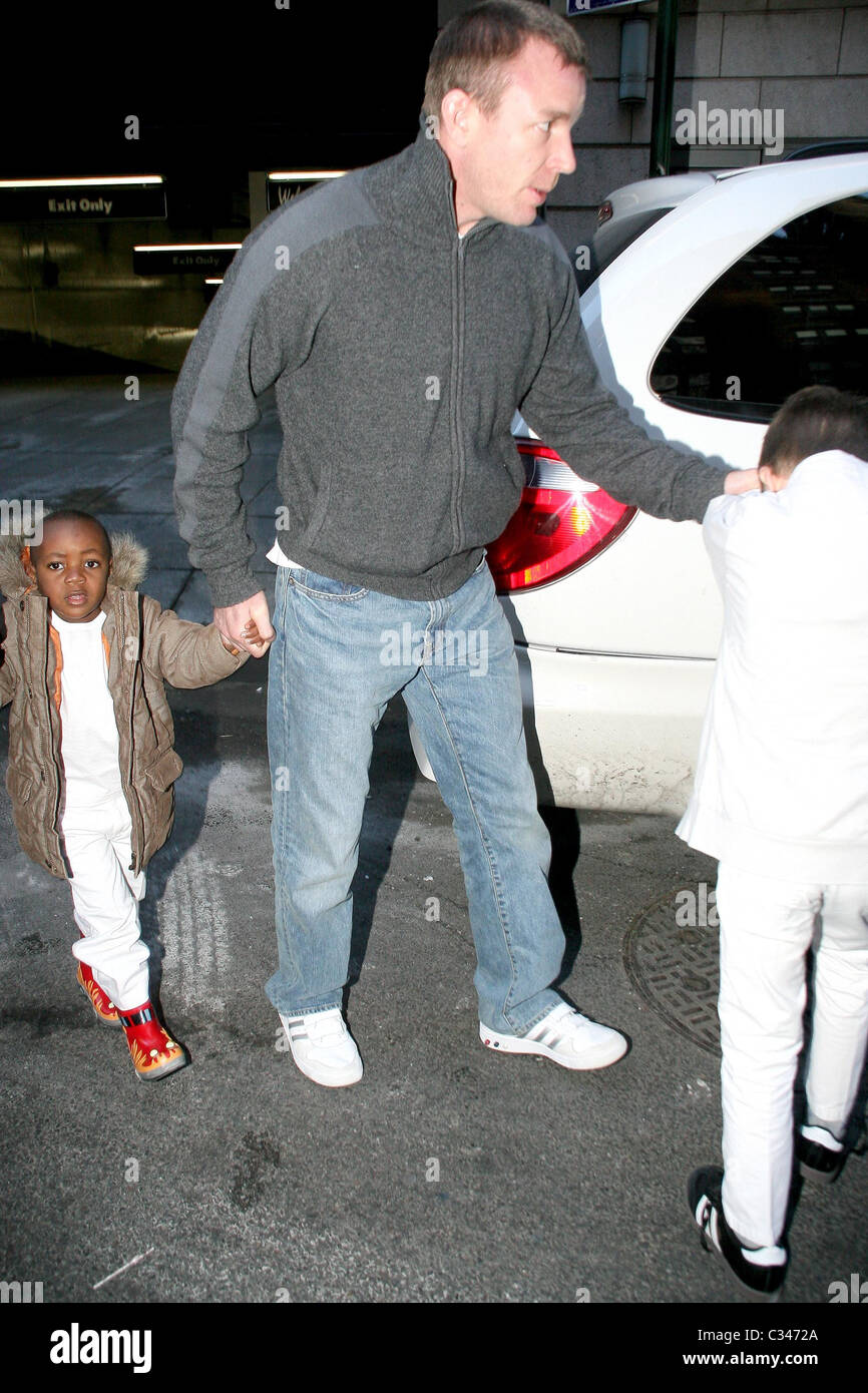 David Banda, Guy Ritchie and Rocco Ritchie Guy Ritchie picking up his ...