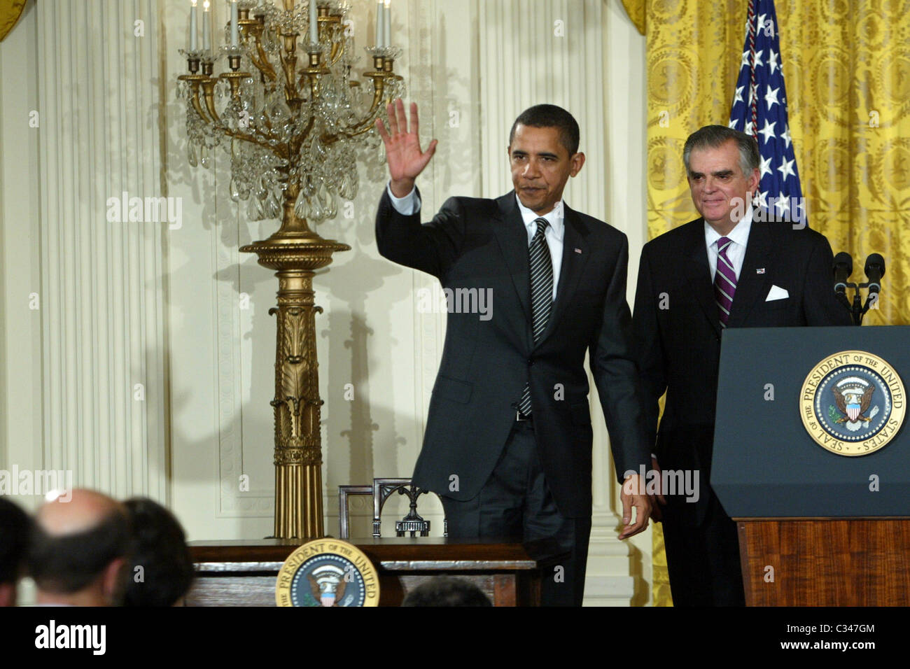 US President Barack Obama, flanked by US Transportation Secretary Ray ...