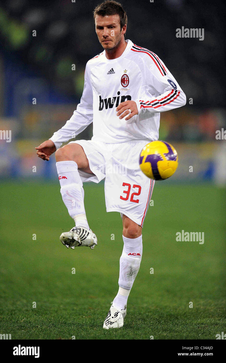 David Beckham in possesion of the ball whilst playing a Serie A match ...