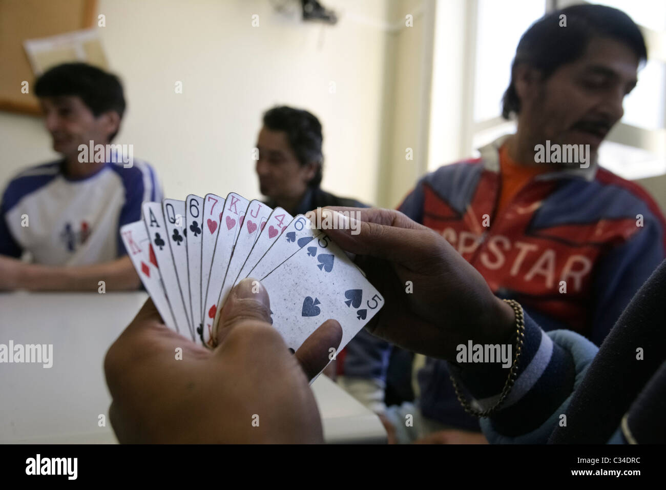 People playing cards Stock Photo - Alamy