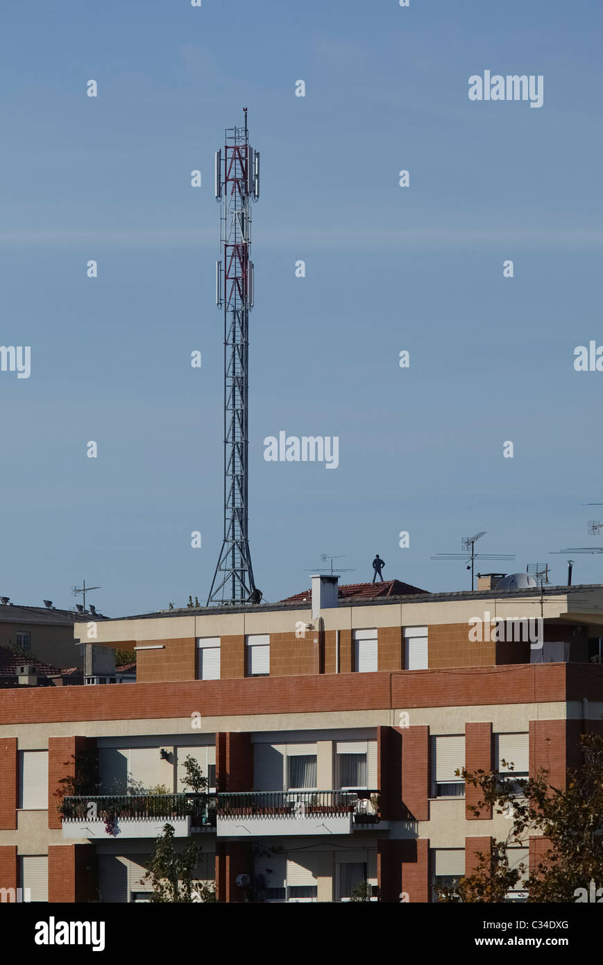 Cellphone 3G communications antenna on top of apartment building Stock ...