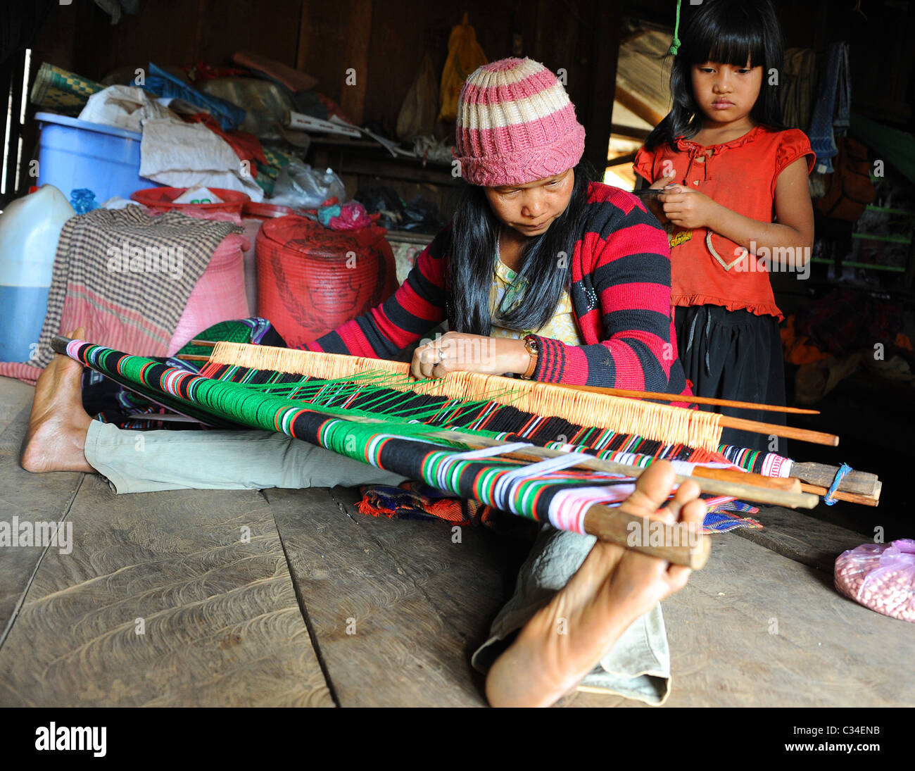 Happy dad carries serious podgy cute son Stock Photo - Alamy