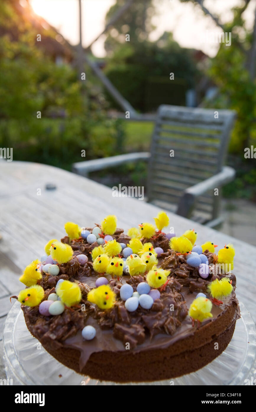 Easter cake covered in chicks and nests Stock Photo - Alamy