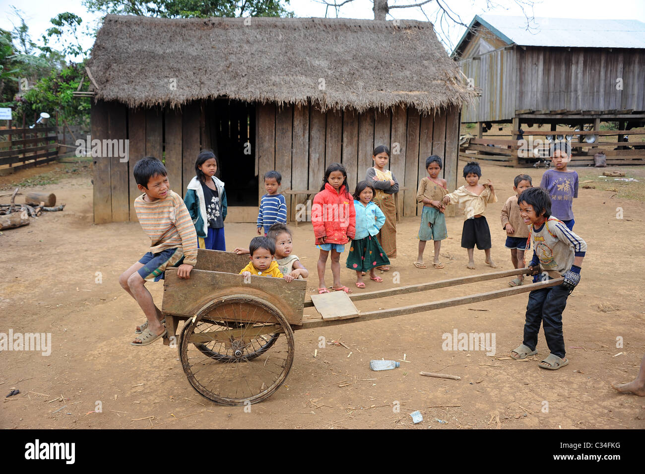 Boys pushing cart hi-res stock photography and images - Alamy