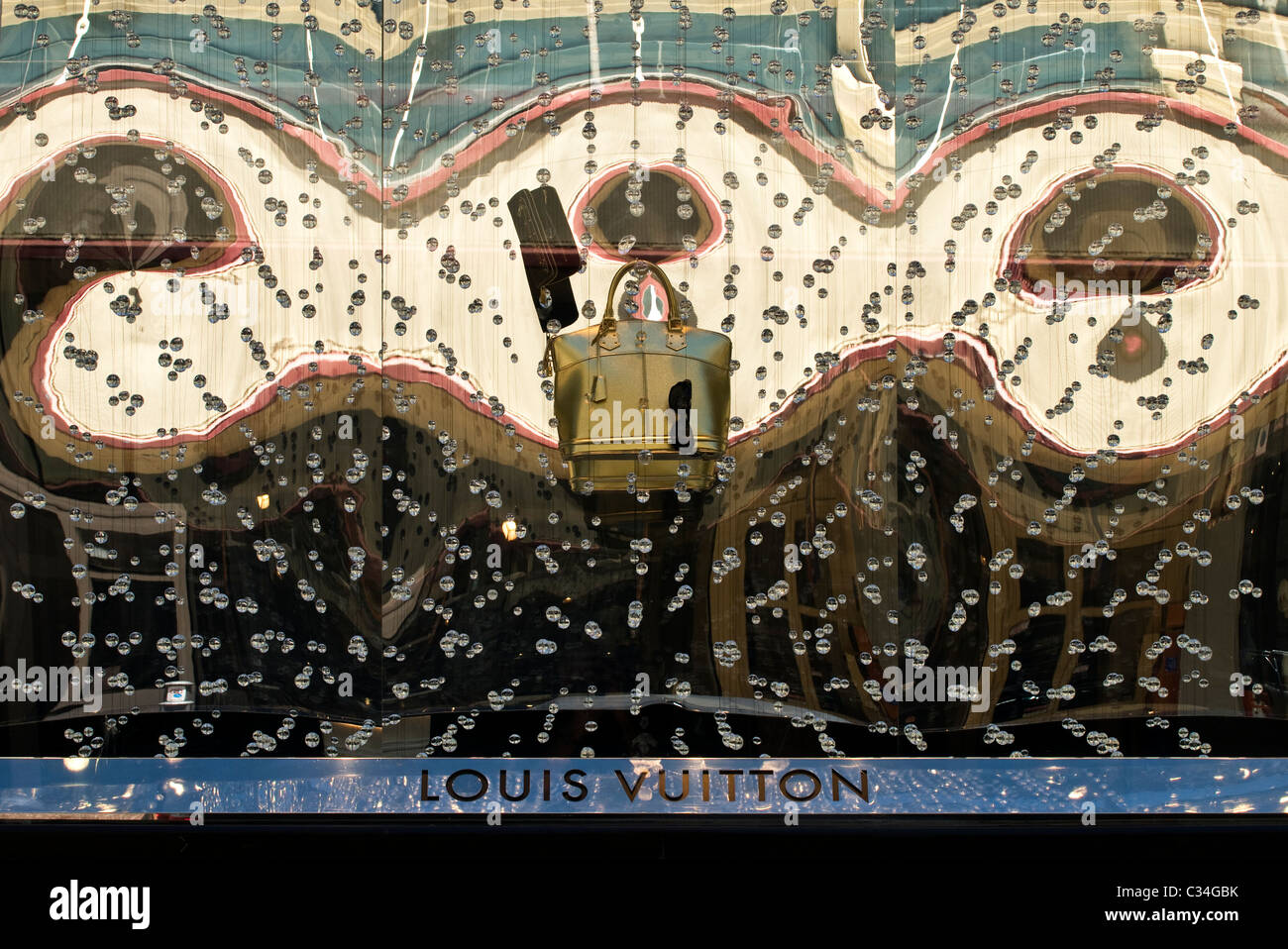 Gold leather bag in Louis Vuitton shopfront display, King St, Perth ...