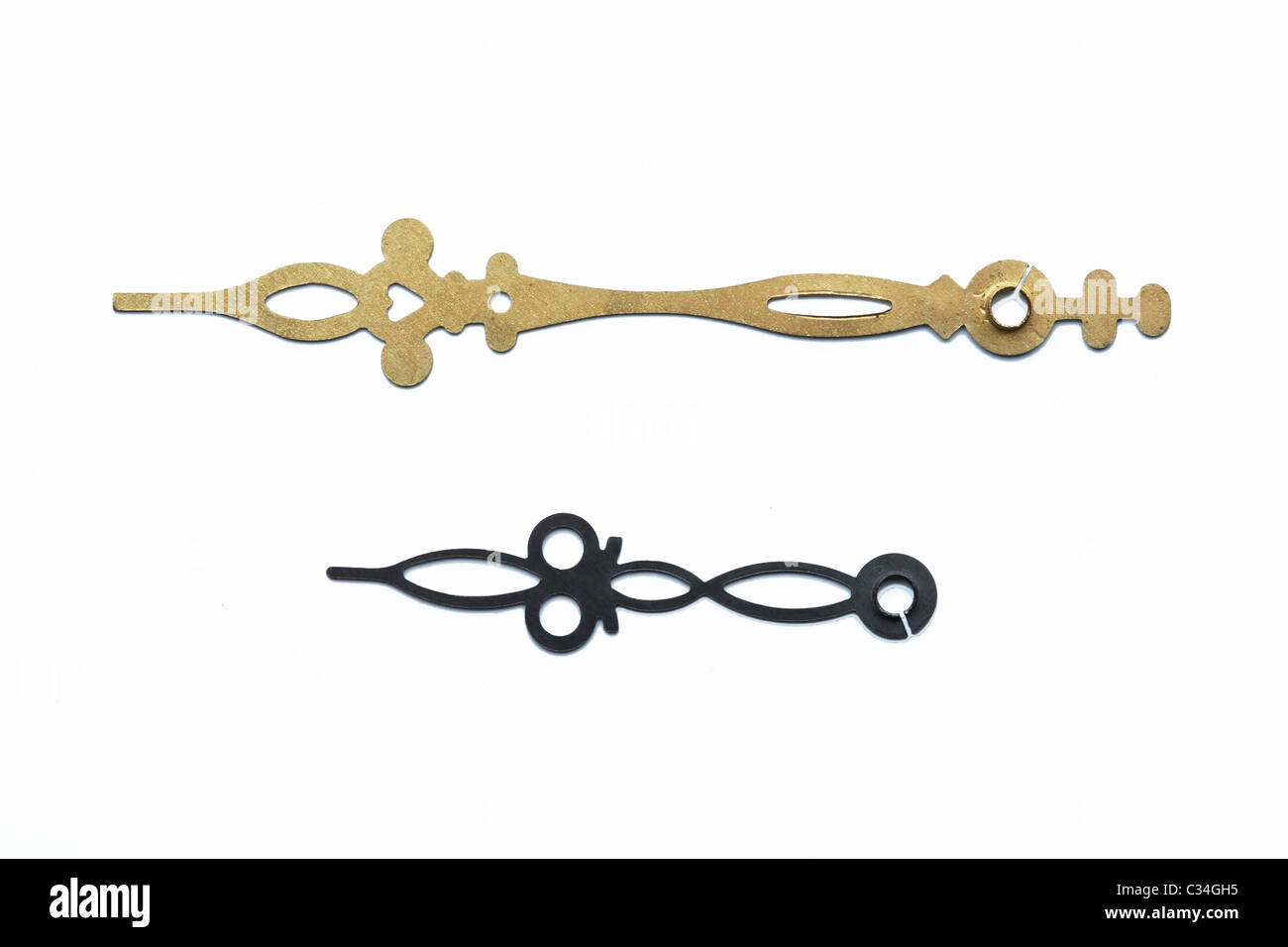 deconstructed old clock arrows on white background Stock Photo - Alamy