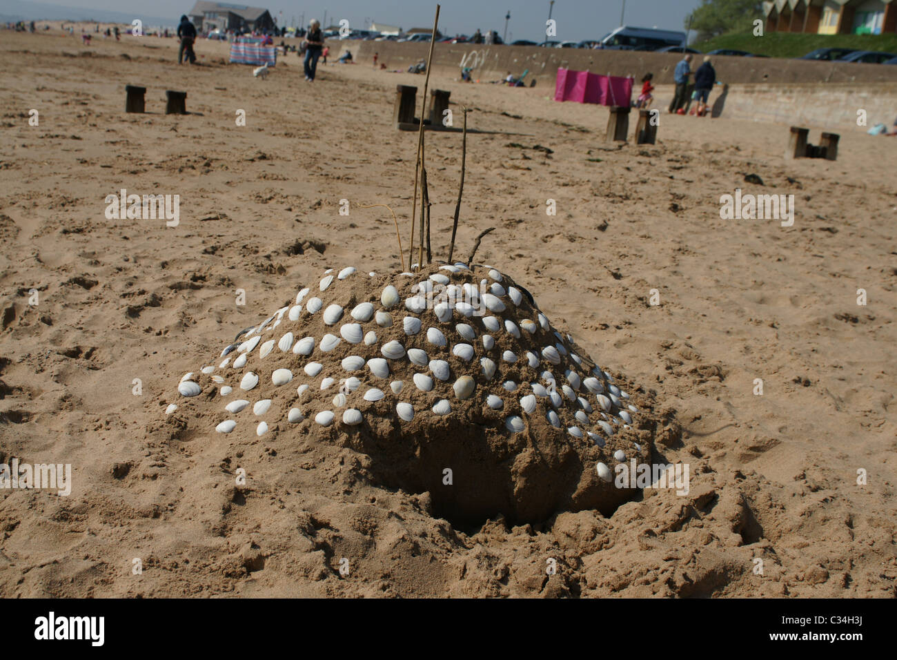 Shells and Sandcastle Stock Photo - Alamy