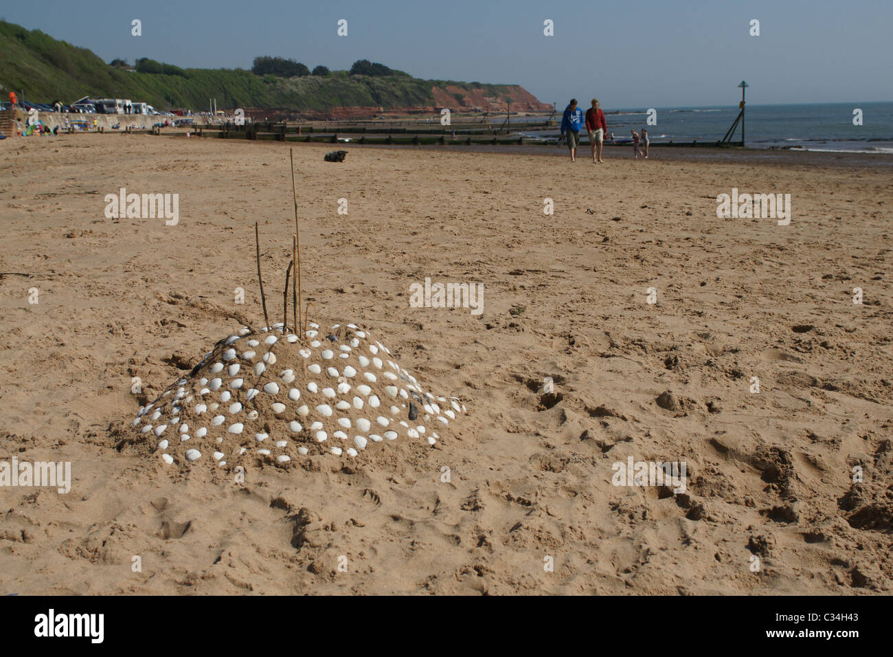 Shells and Sandcastle Stock Photo - Alamy