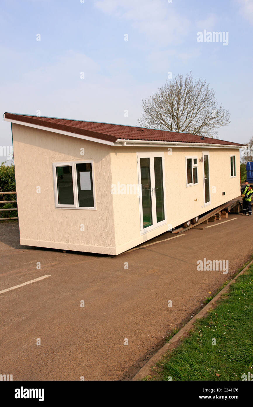 Truck hauling house hi-res stock photography and images - Alamy