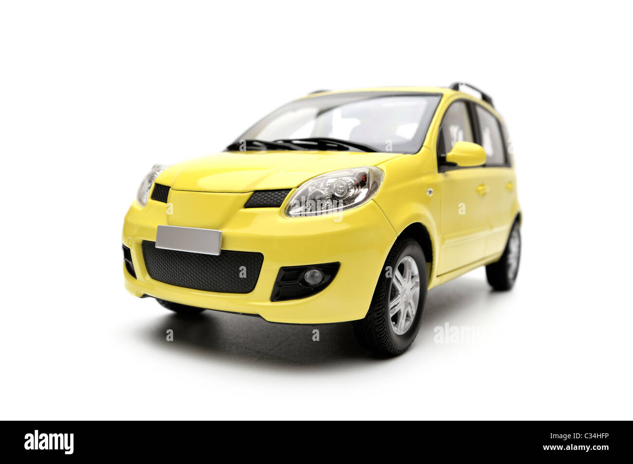 Generic modern yellow family car model on a white background, isolated ...