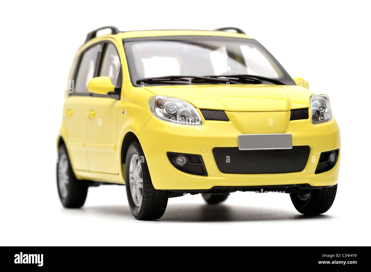 Generic modern yellow family car model on a white background, isolated ...